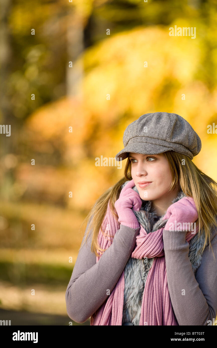Autumn park - fashion model woman wear cap on sunny day Stock Photo - Alamy