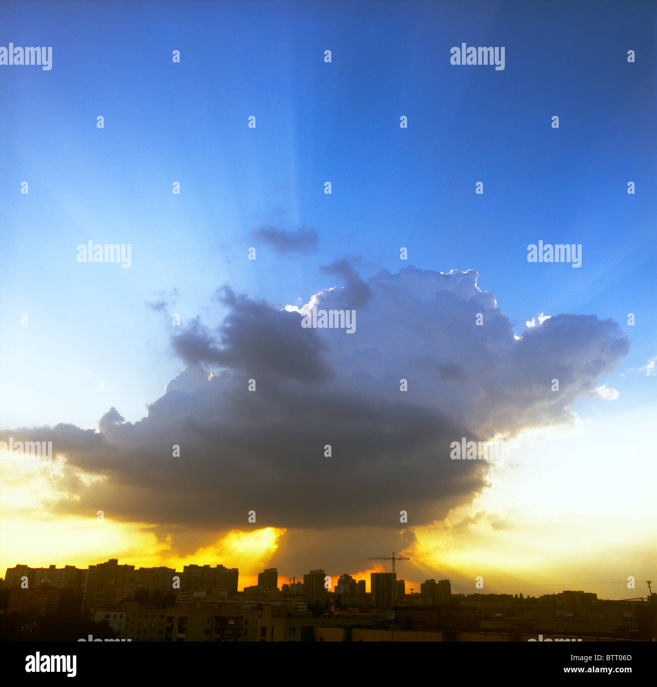Sunbeam through the clouds Stock Photo - Alamy