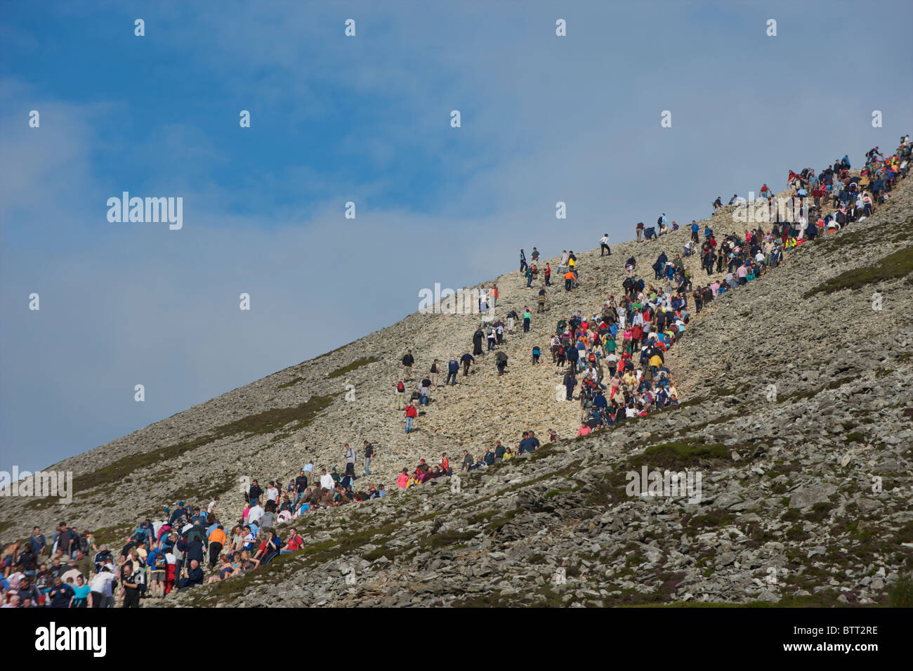 People climbing Croagh Patrick a holy mountain in County Mayo, Ireland ...