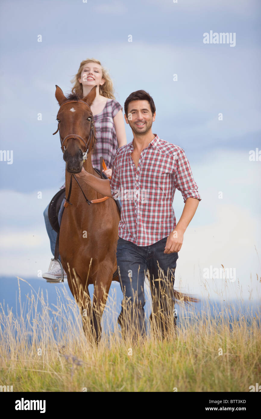 People and horses Stock Photo - Alamy