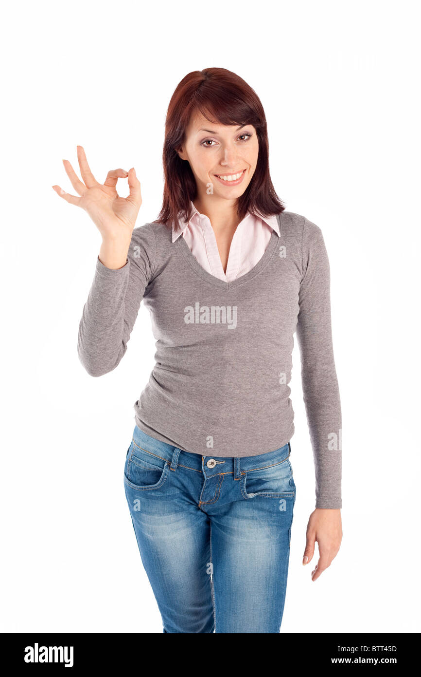 An isolated on white shot of a beautiful woman showing an OK sign Stock ...