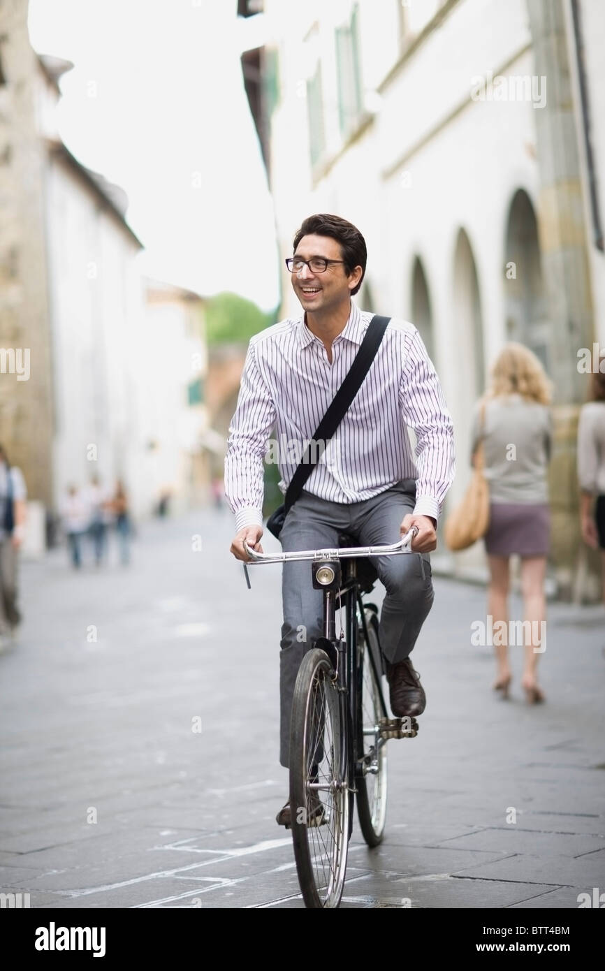 Man on a bike Stock Photo - Alamy