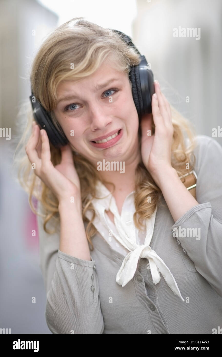 Young woman hearing music Stock Photo - Alamy