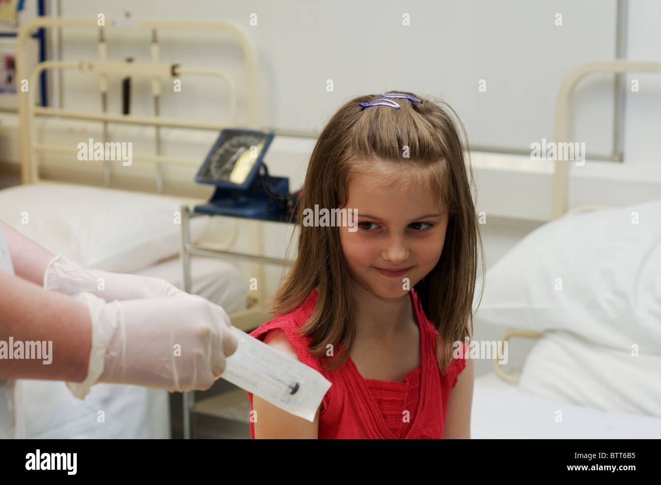 Young girl in hospital ward getting ready to have an injection Stock ...