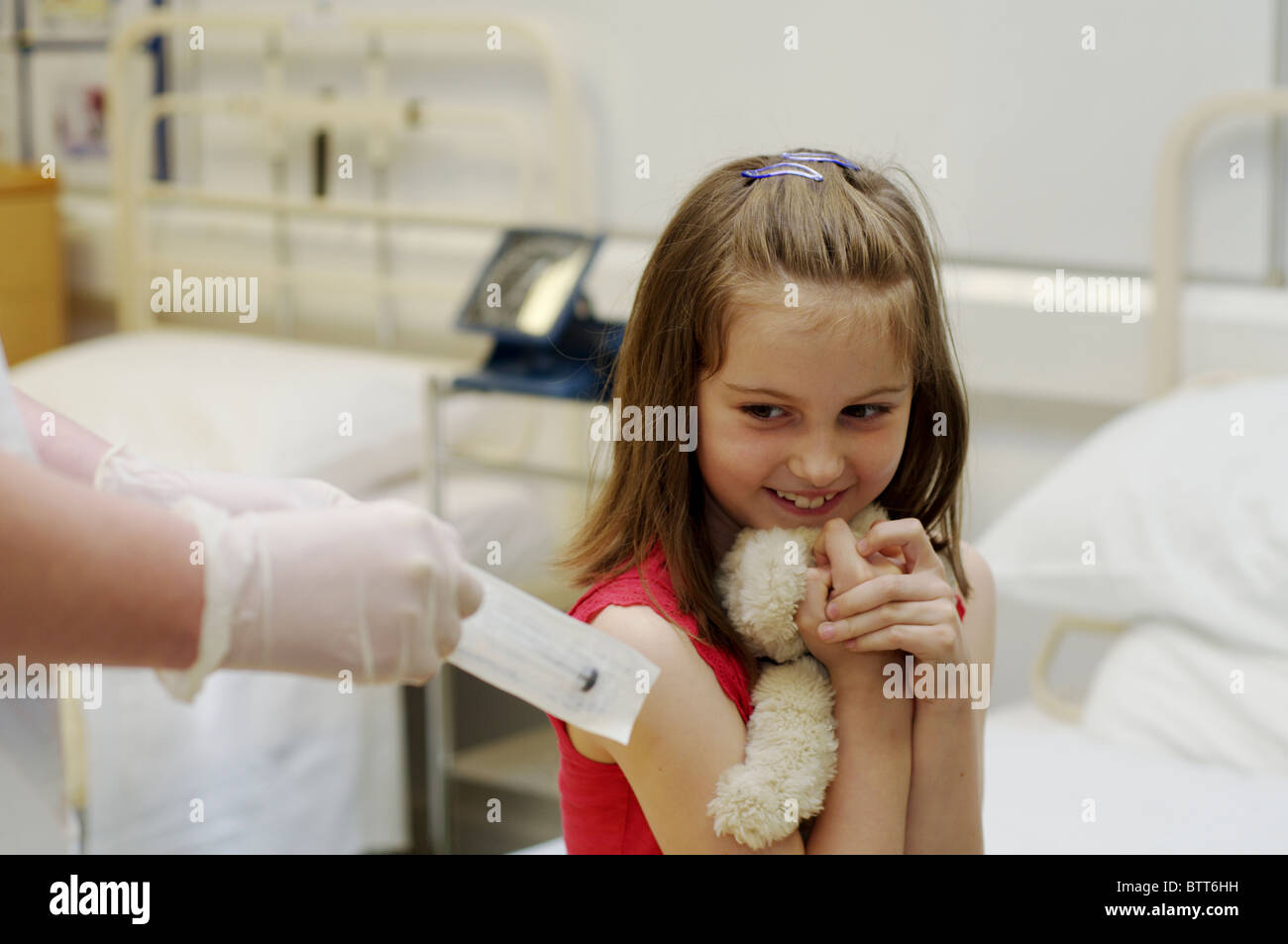 Young girl in hospital ward getting ready to have an injection Stock ...