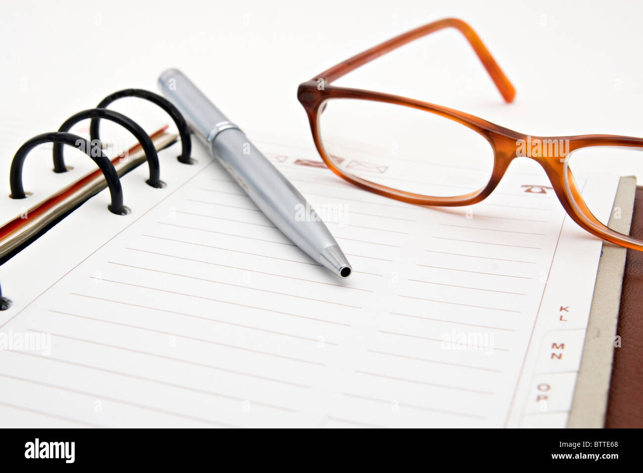 Pen opened notebook glasses hi-res stock photography and images - Alamy