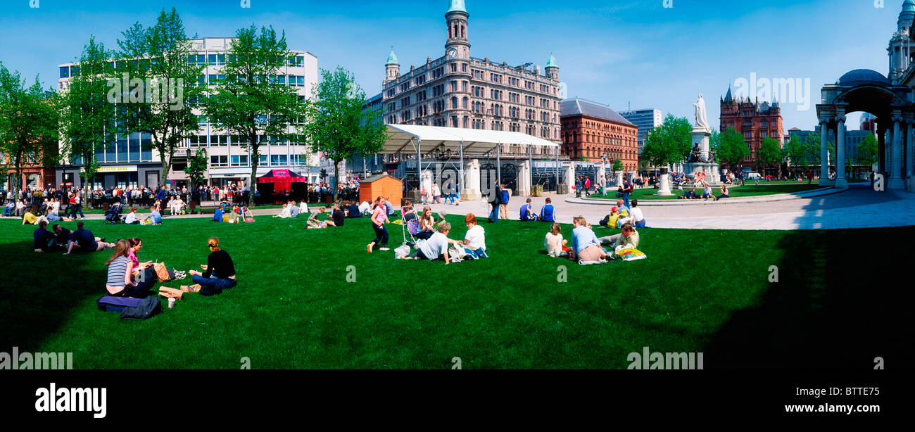 Belfast City Hall, Belfast, Co Antrim, Ireland; People Sitting On Lawn ...