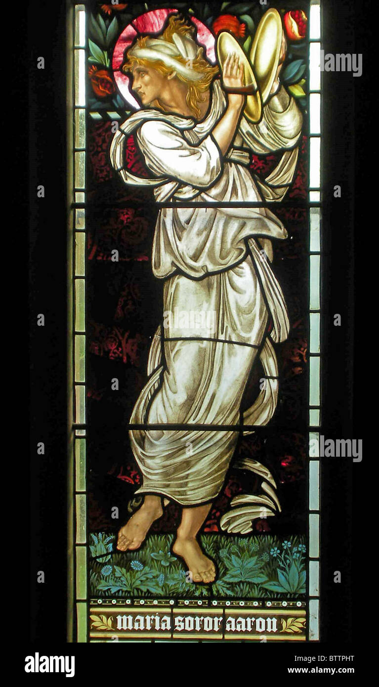 A stained glass window by Edward Burne-Jones depicting Saint Miriam ...
