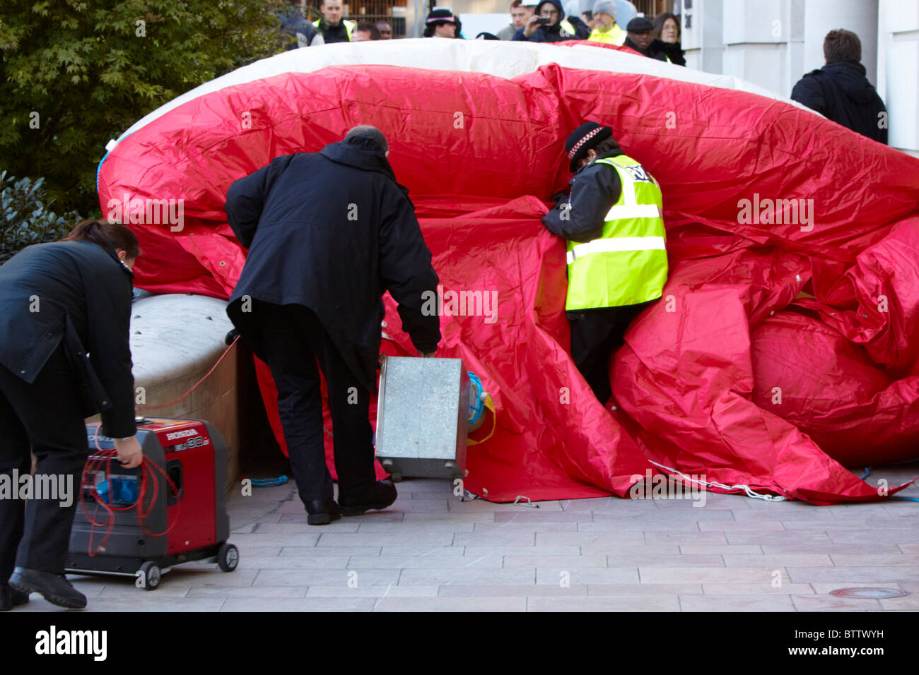 Police set up a decontamination tent after a nearby chemical spill ...