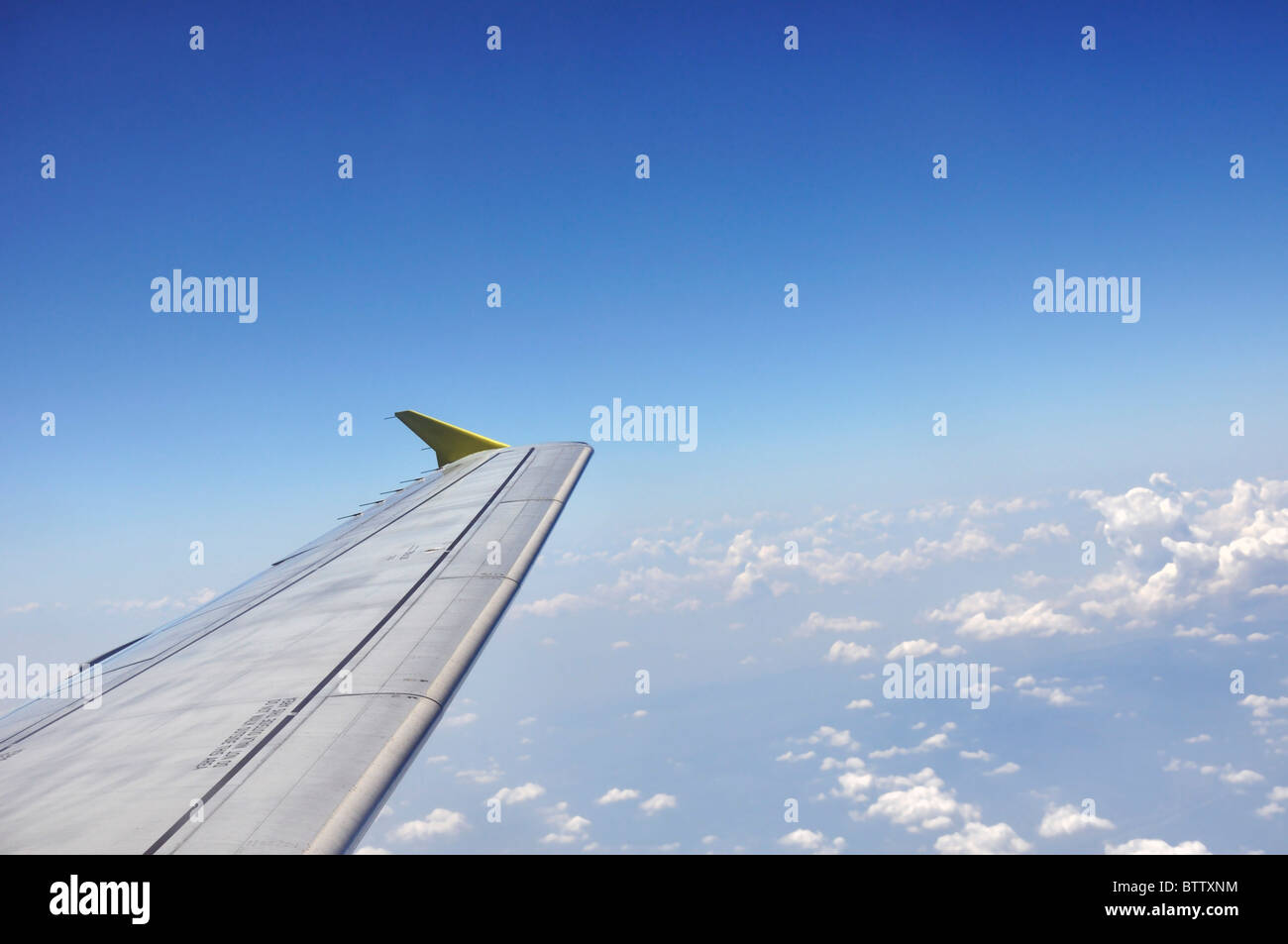 View from airplane window with view of wing Stock Photo - Alamy