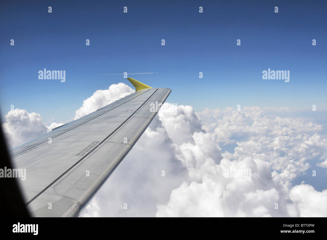 View from airplane window with view of wing Stock Photo - Alamy