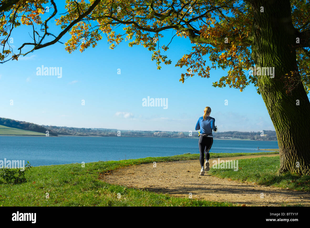 Lone runner hi-res stock photography and images - Alamy