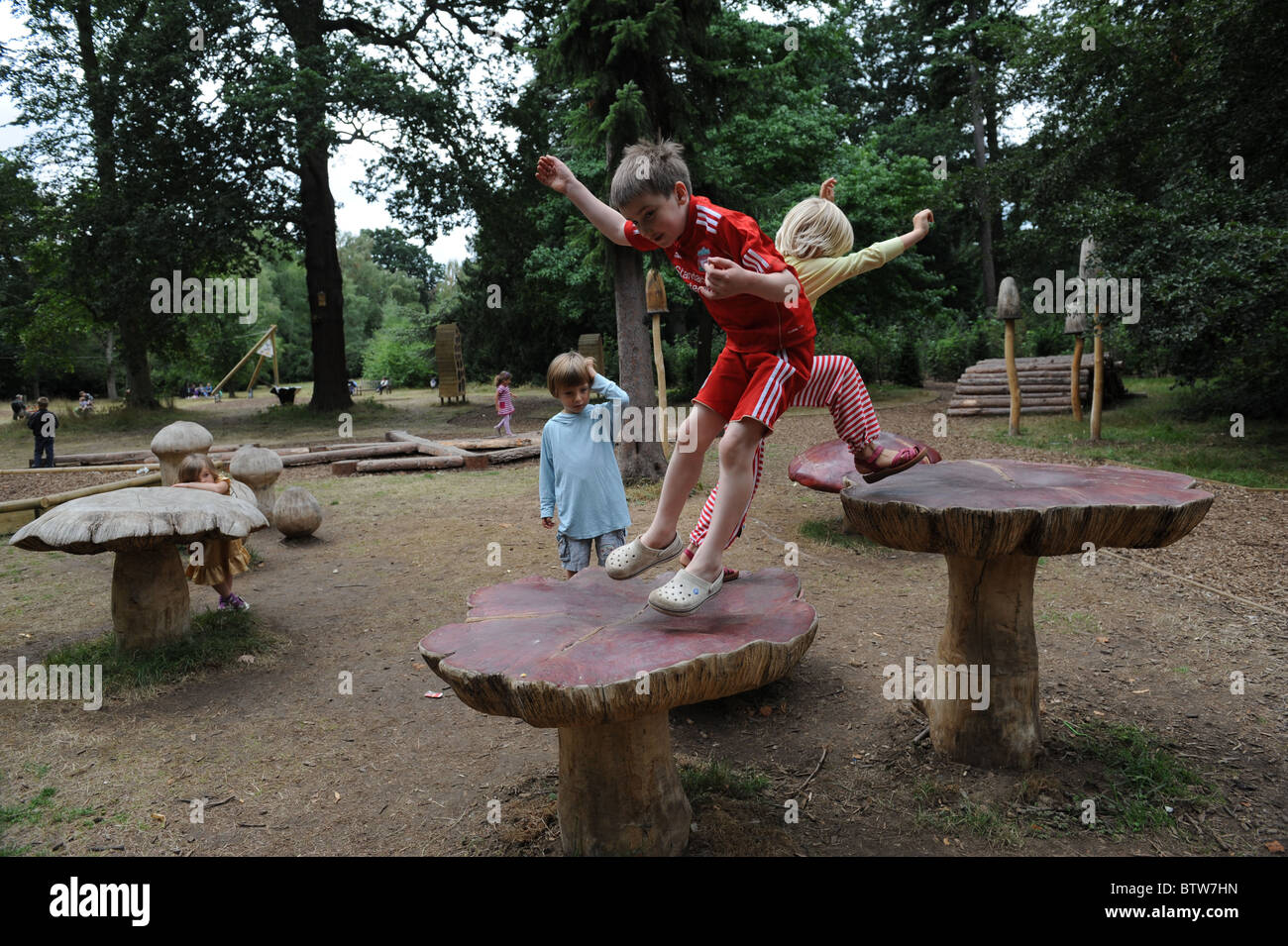 children playing in kew gardens on plantastic Stock Photo - Alamy