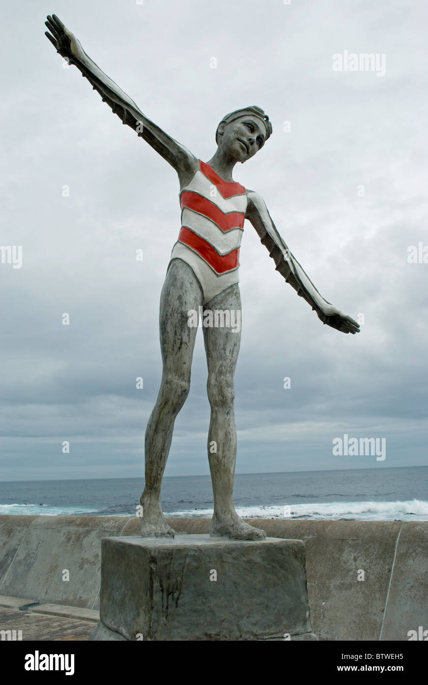 Statue on of girl swimmer on Sea Point Promenade, Cape Town Stock Photo ...