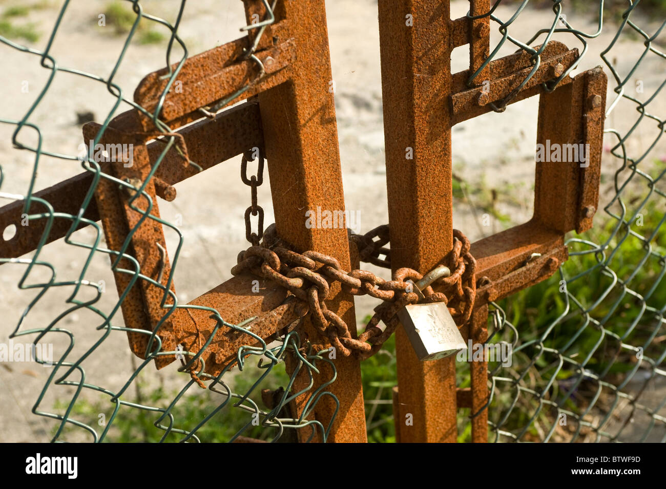 Padlock and Cobwebs on a Rusty Gate Stock Photo - Alamy