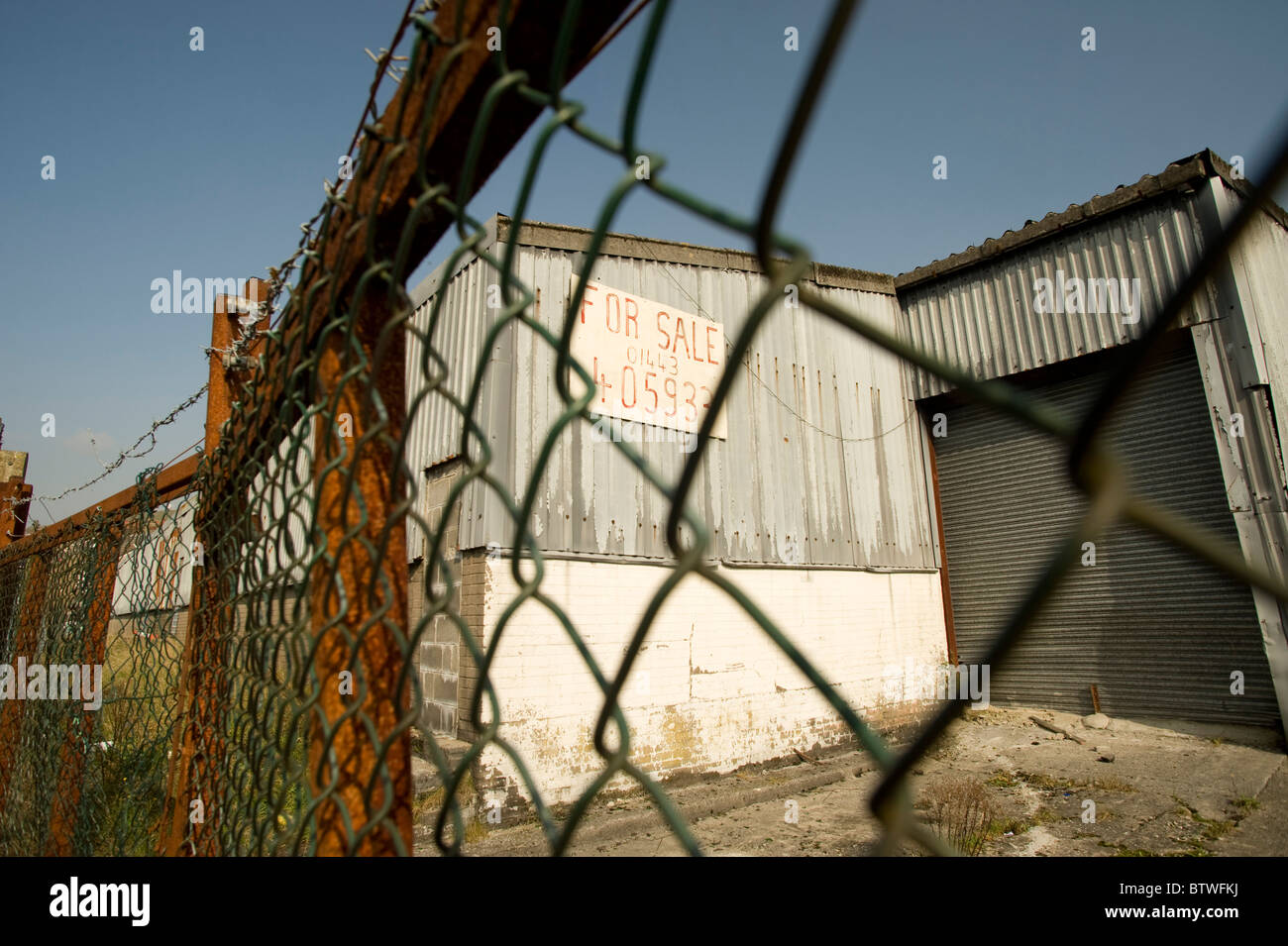 For Sale Sign on an Empty Factory Stock Photo - Alamy