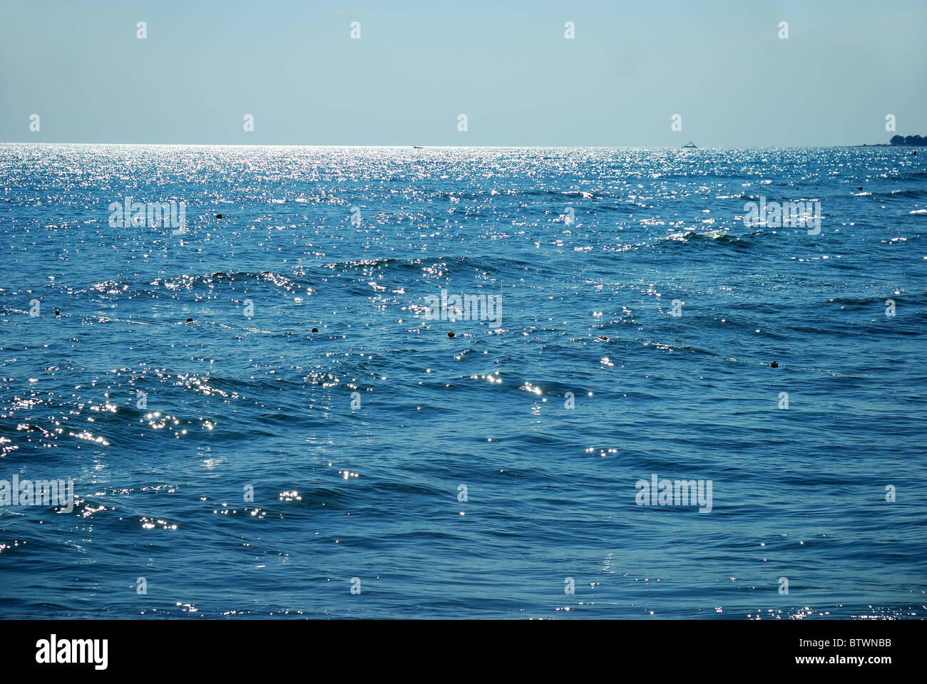View of a blue wavy seascape Stock Photo - Alamy