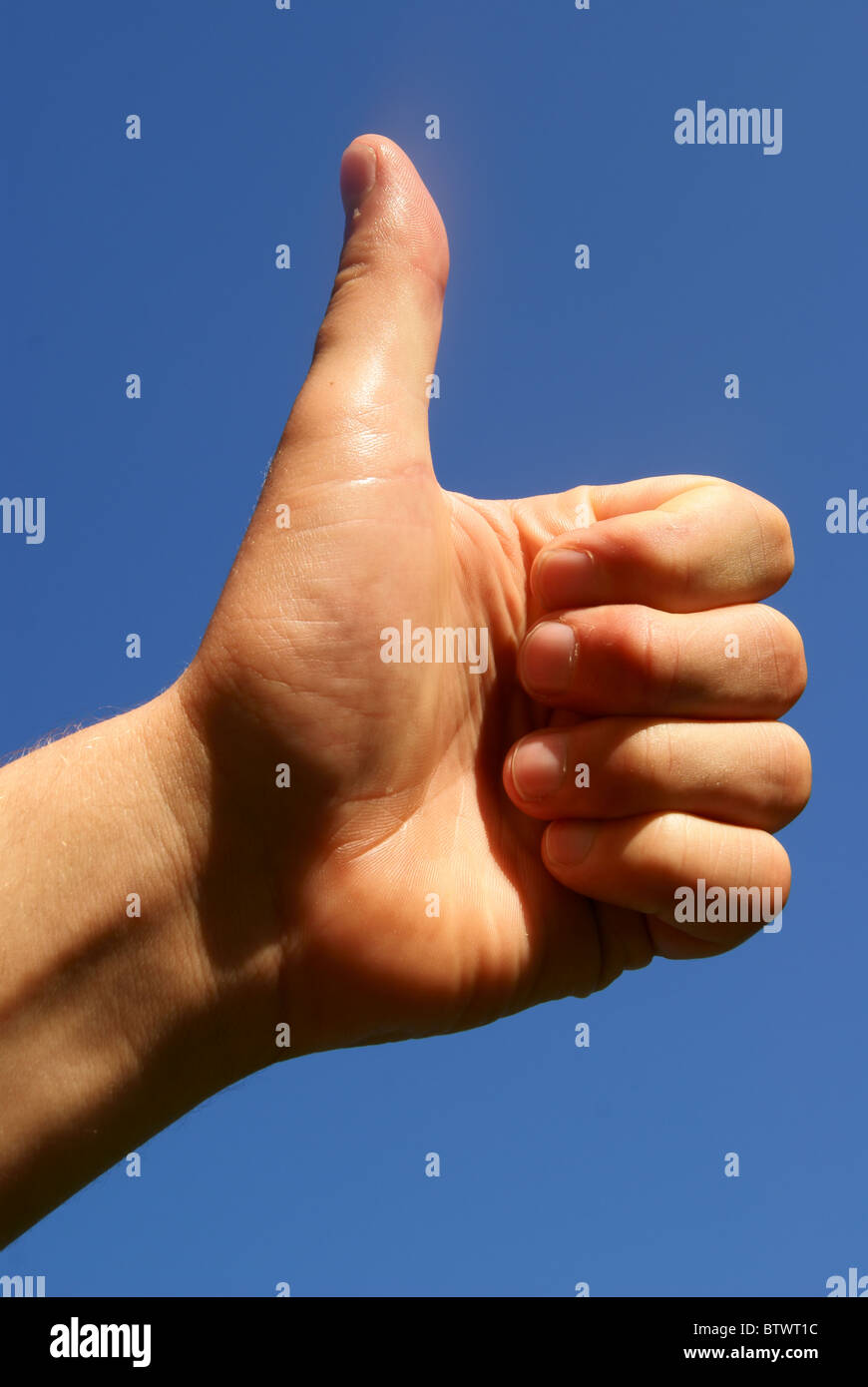 Hand with Thumbs up, a sign for very good! Stock Photo - Alamy