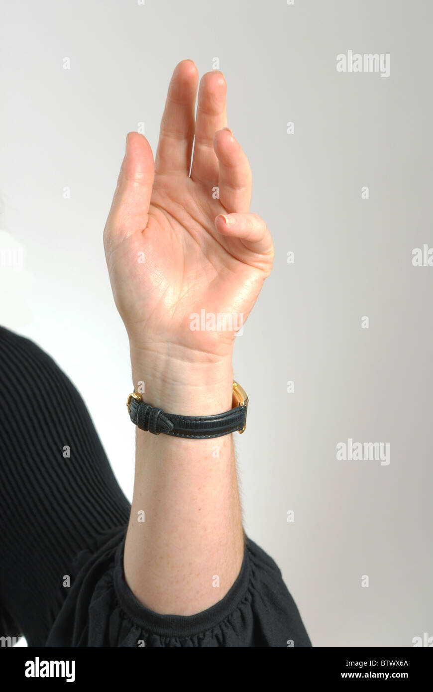woman's hand in the air Stock Photo - Alamy