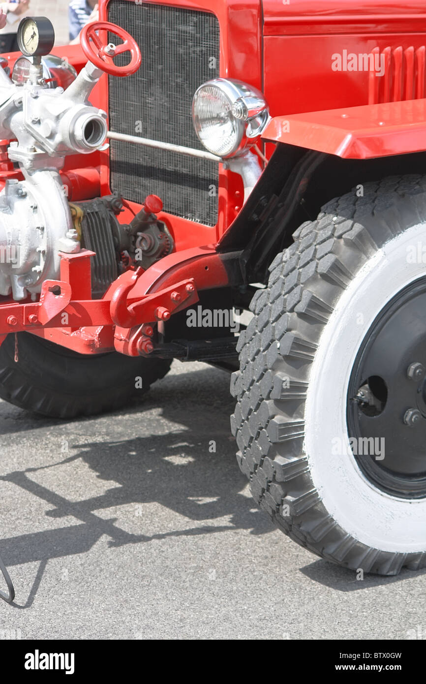 Red vintage fire truck (fire-engine) closeup Stock Photo - Alamy