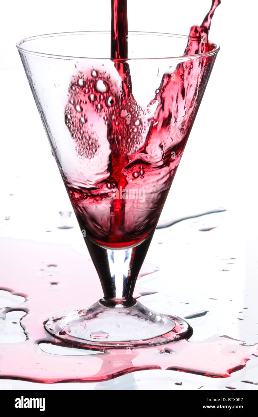 Pouring wine wineglass Cut Out Stock Images & Pictures - Alamy