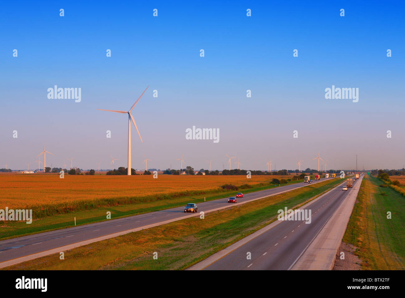 Wind turbines highway cars hi-res stock photography and images - Alamy