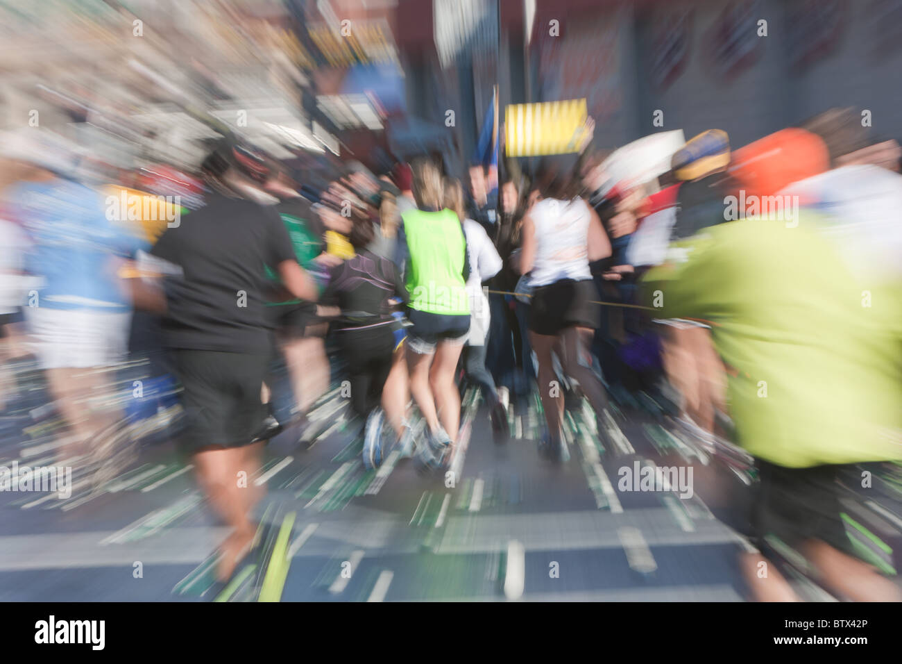 Blurred abstraction of runners from behind in the 2010 New York City ...