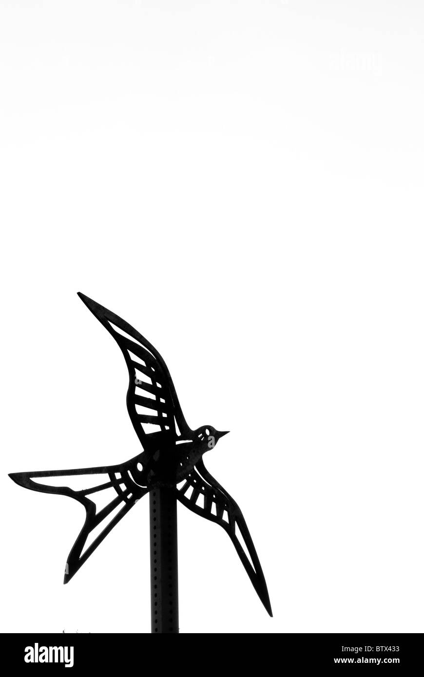 Tethered metal bird in black and white Stock Photo - Alamy