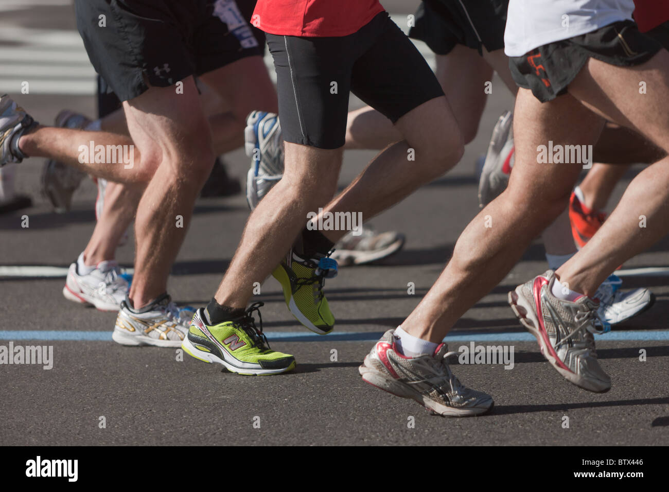 The legs and feet of runners during the 2010 New York City Marathon ...