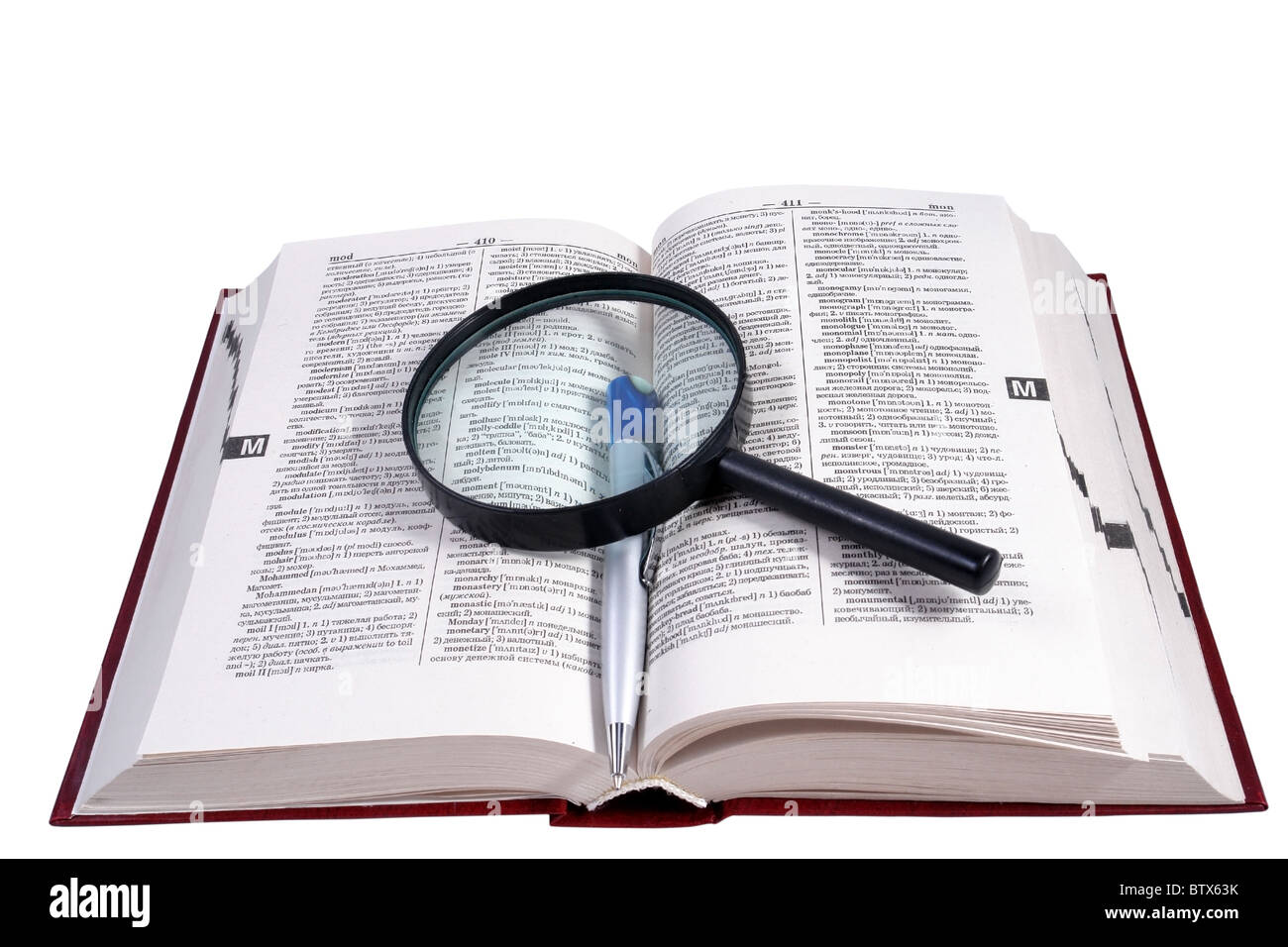 old book and magnifying glas Stock Photo - Alamy