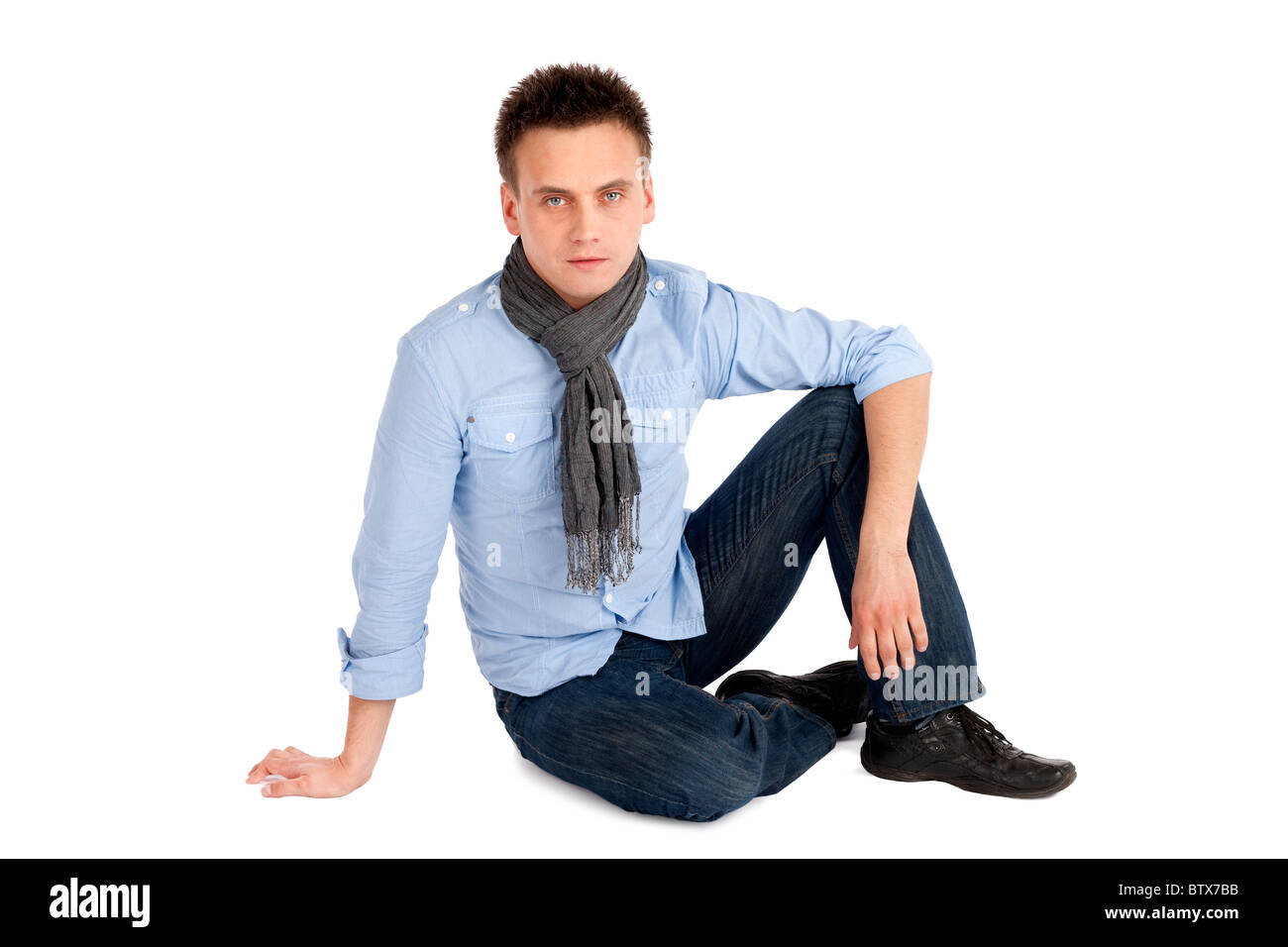 People sitting on the ground Cut Out Stock Images & Pictures - Alamy