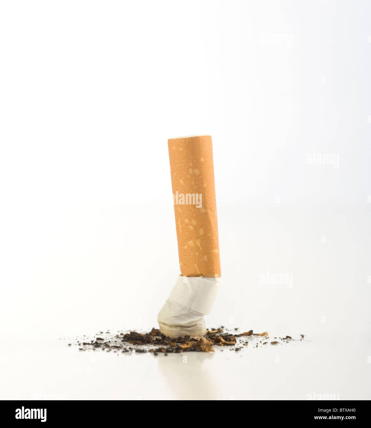 Single cigarette butt Stock Photo - Alamy
