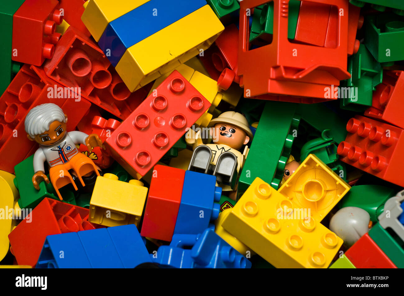 Brightly coloured children's building bricks Stock Photo - Alamy