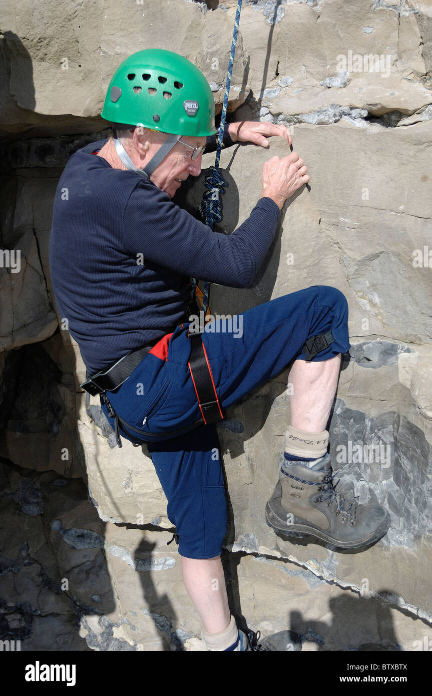 A 75 year old man learning to rock climb at Dancing Ledge Purbeck ...