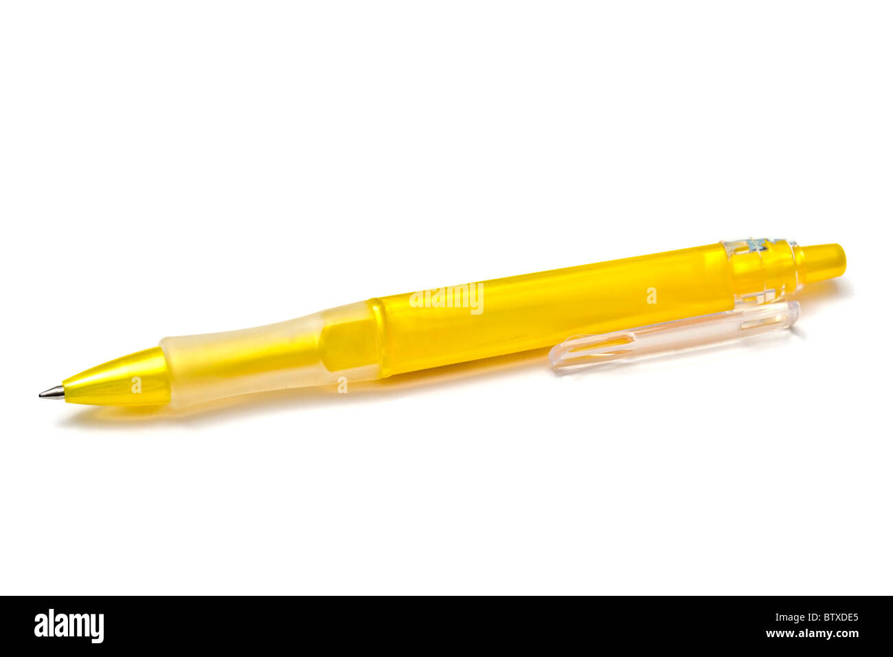 Yellow pen closeup on the white background Stock Photo - Alamy