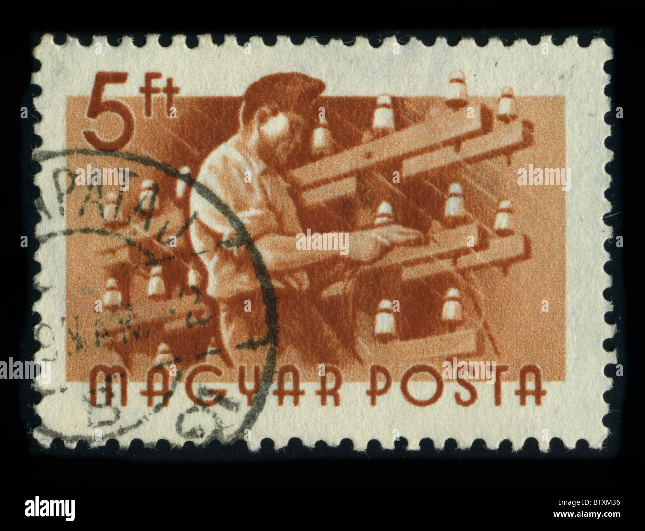 GUNGARY - CIRCA 1980: A stamp dedicated to the An electrician is a ...
