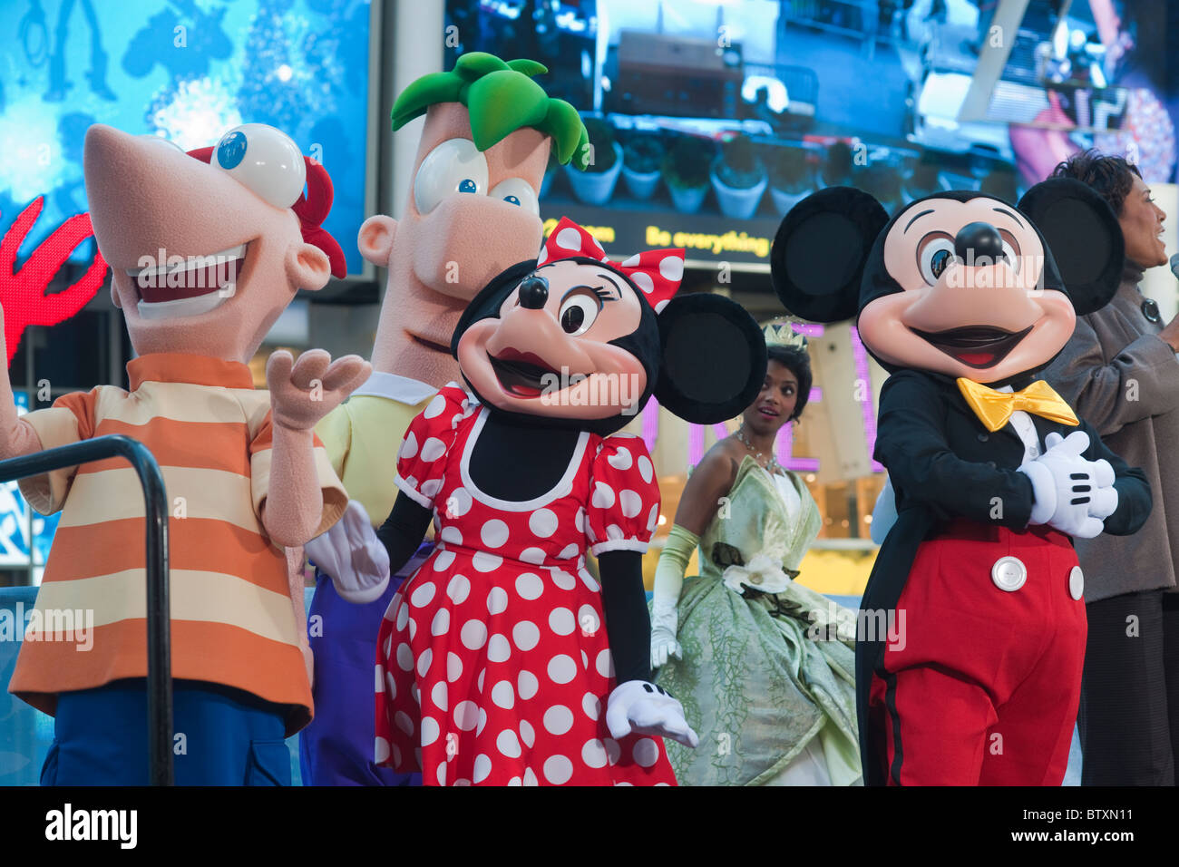 Actors portraying various Disney characters at the opening ceremony of ...