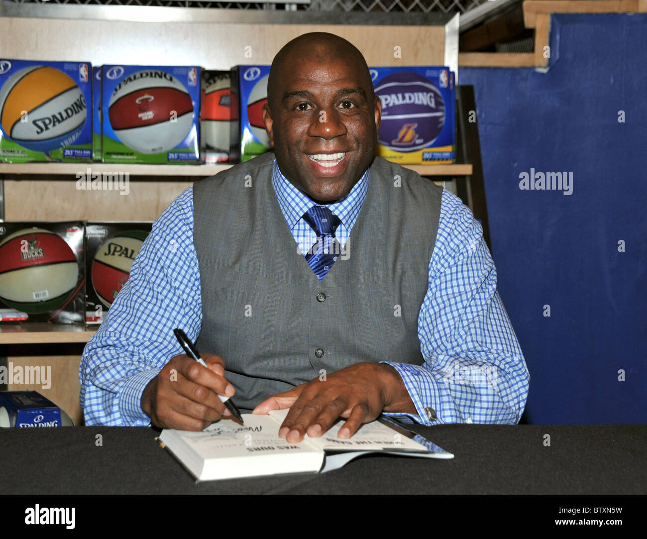 Magic Johnson's When the Game Was Ours Book Signing Stock Photo - Alamy