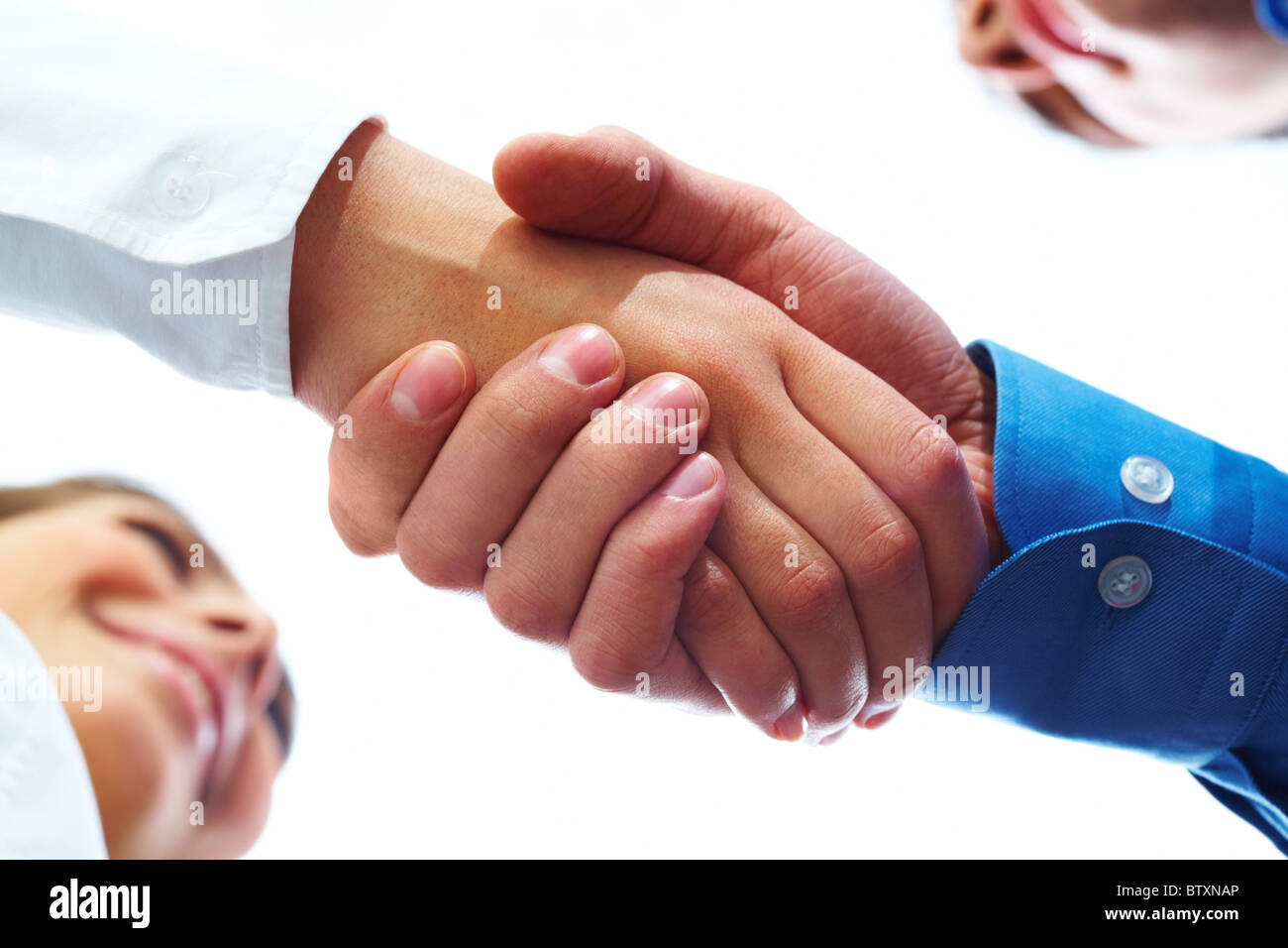 Image of partners handshake after signing contract Stock Photo - Alamy