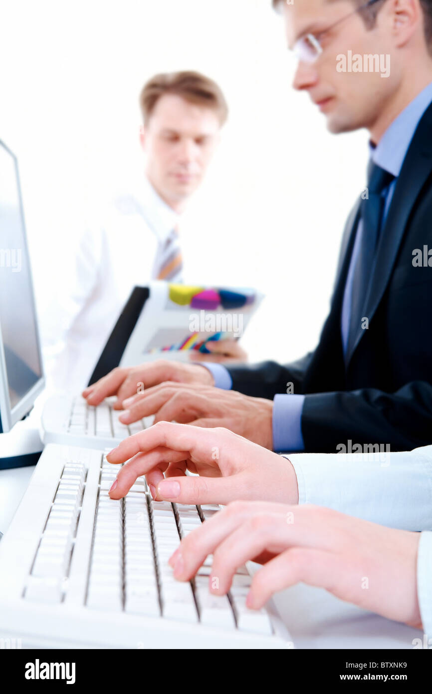 Image of secretary hands typing document on the background of working ...