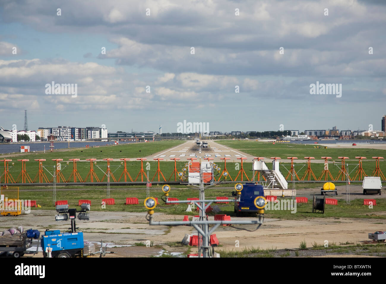 cleaning the runway at London City Airport Stock Photo - Alamy