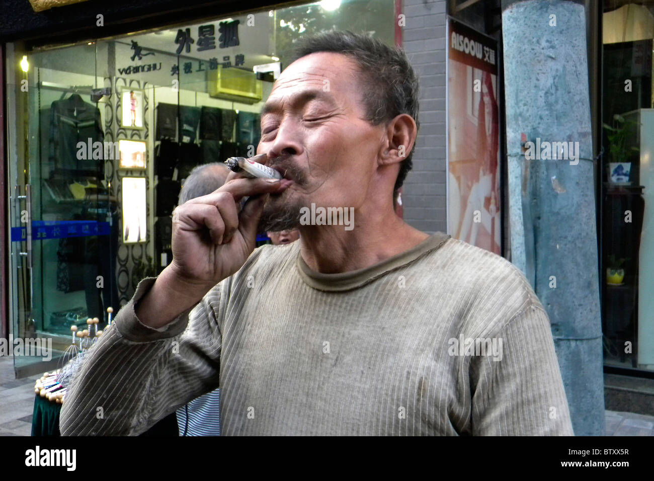 Enjoy a good cigar! Xi'an, China Stock Photo - Alamy