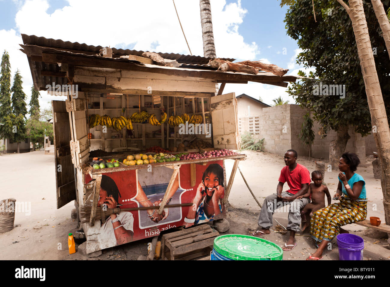 Local traders selling local produce at a stall. Dar es Salaam Tanzania ...