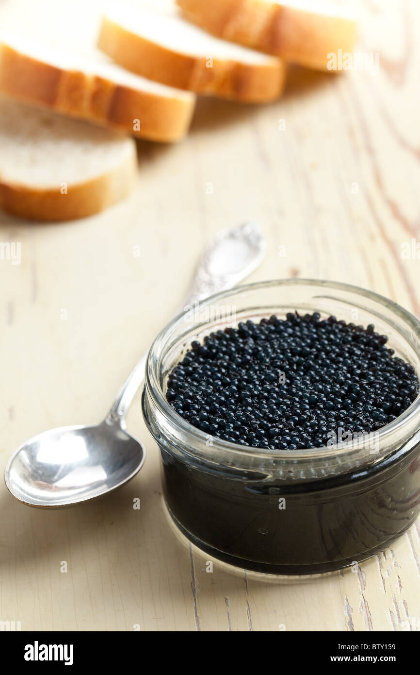 black caviar in glass jar Stock Photo - Alamy