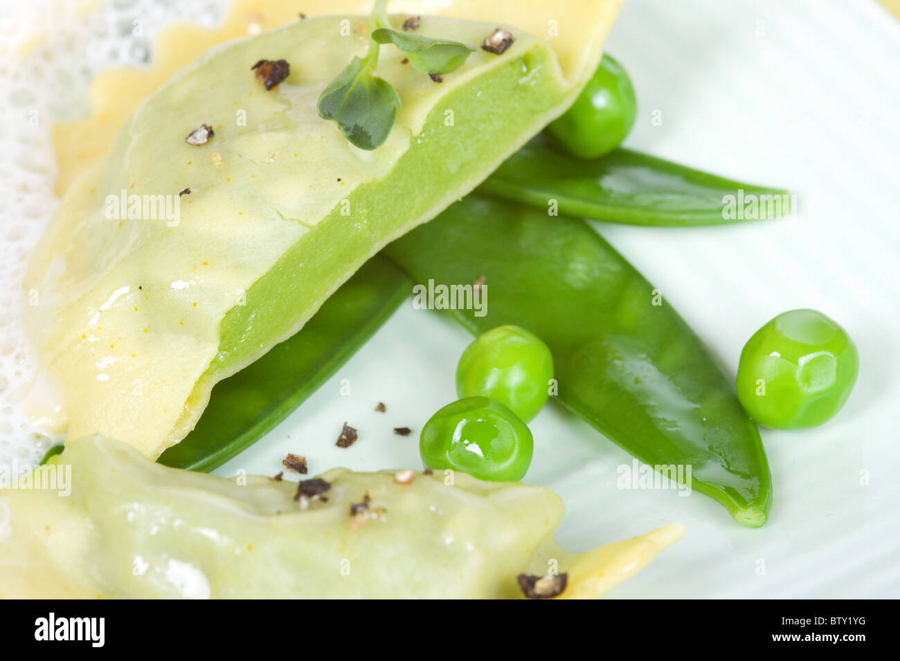 Ravioli with pea puree Stock Photo - Alamy
