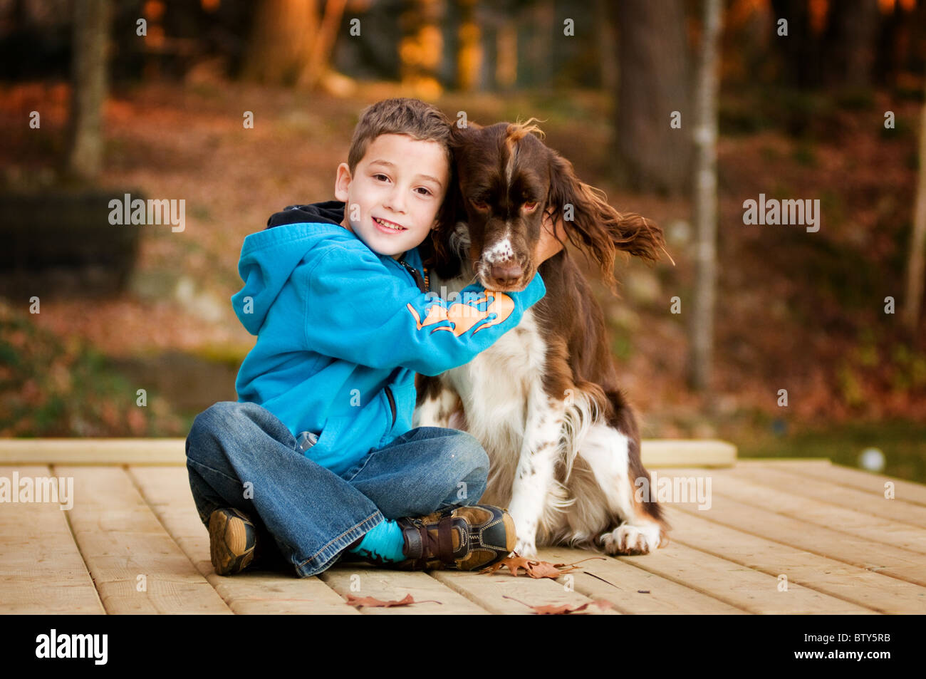 young boy with his pet dog Stock Photo - Alamy