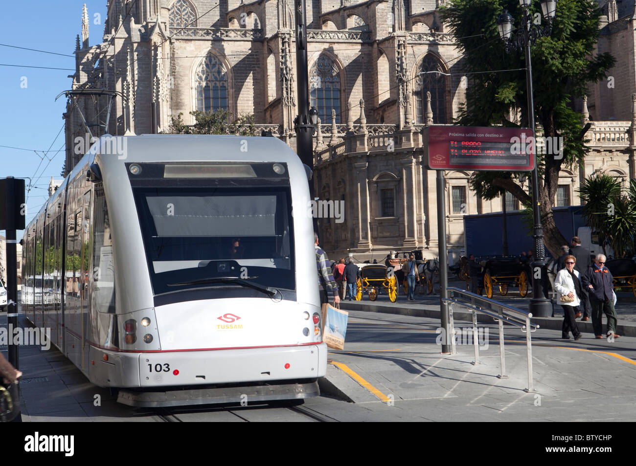 Tram circulating through the city of Seville Stock Photo - Alamy