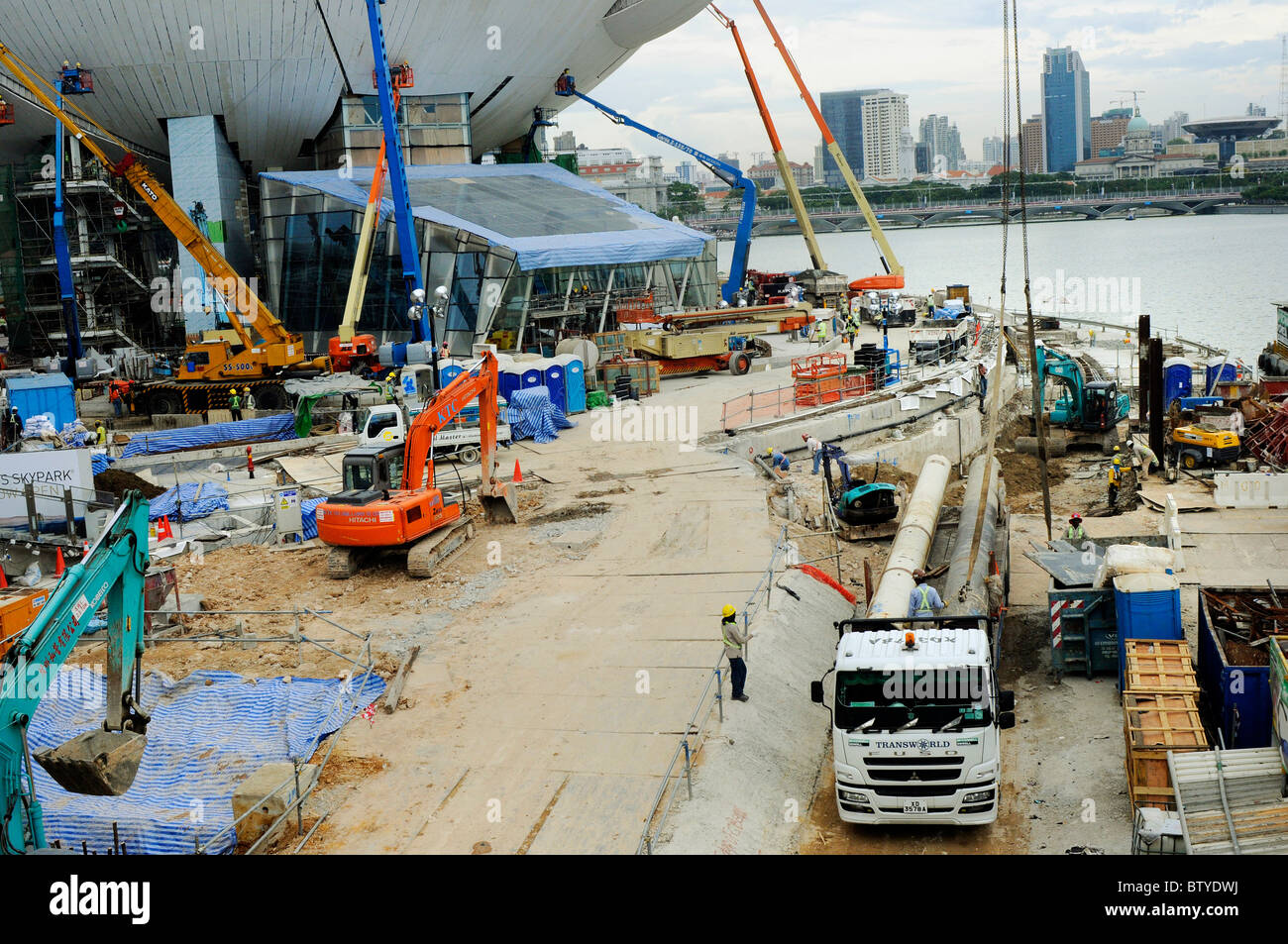 Singapore skyline and its lotus shaped Museum at Marina Bay Sands under ...