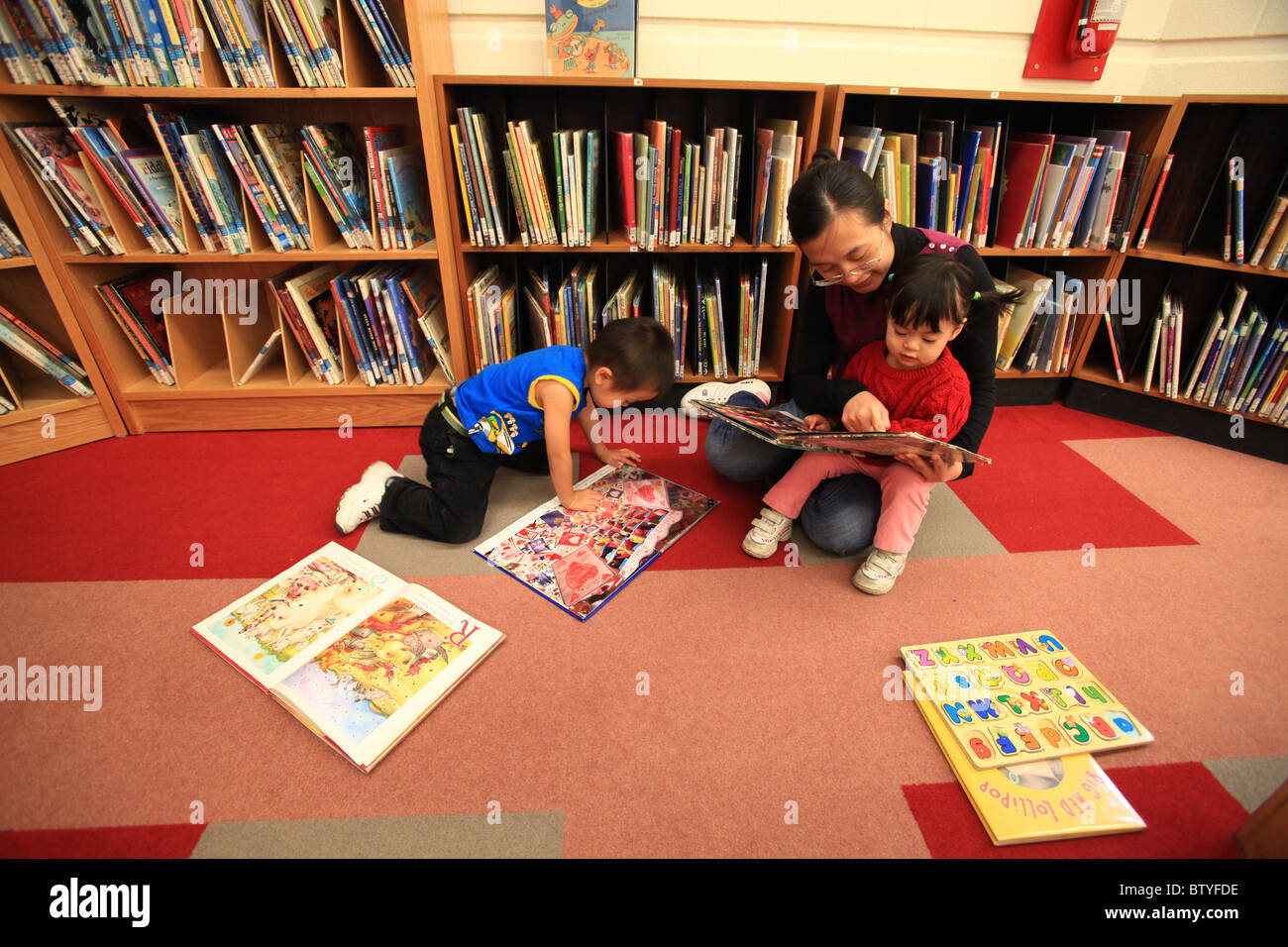 Boy studying in library picture hi-res stock photography and images - Alamy