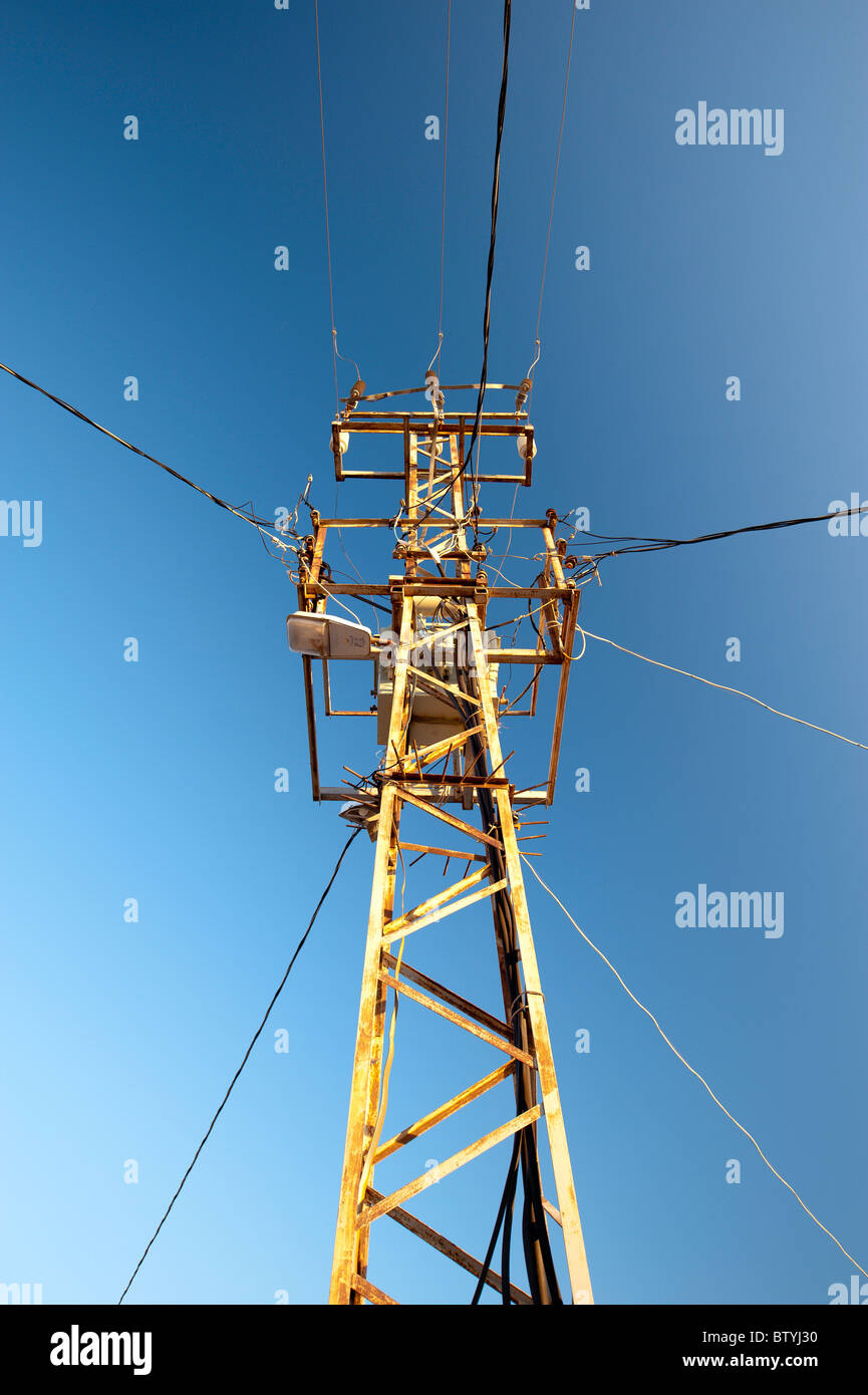 An electricity pylon is used for street lighting, telephone cabling and ...